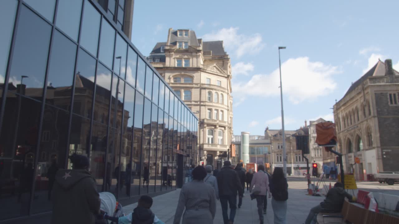 Old And New Buildings In Cardiff City Centre With Pedestrians Free ...