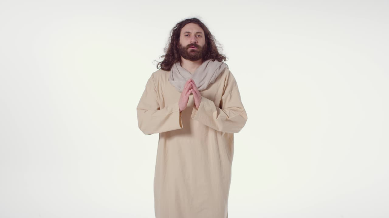 Free stock video - Portrait of man wearing robes with long hair and ...