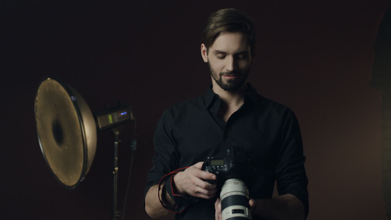 Free stock video - Close-up view of caucasian young man watching photos ...