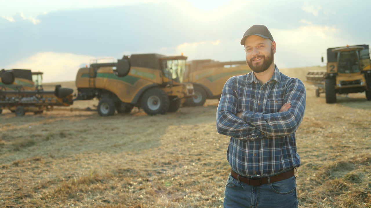 Free stock video - Portrait shot of farmer standing in the field and ...