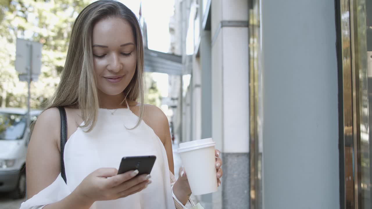 Free stock video - Caucasian woman browsing via smartphone, reading chat