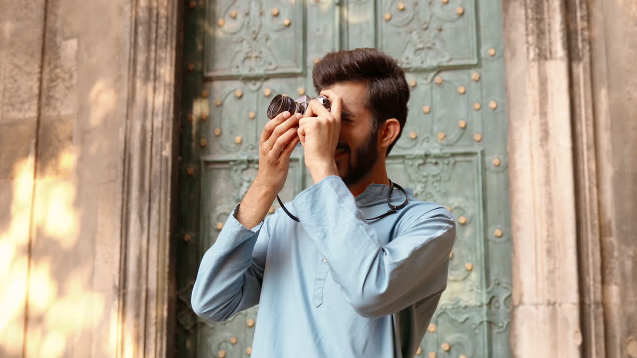 Free stock video - Portrait of a handsome indian man taking pictures ...