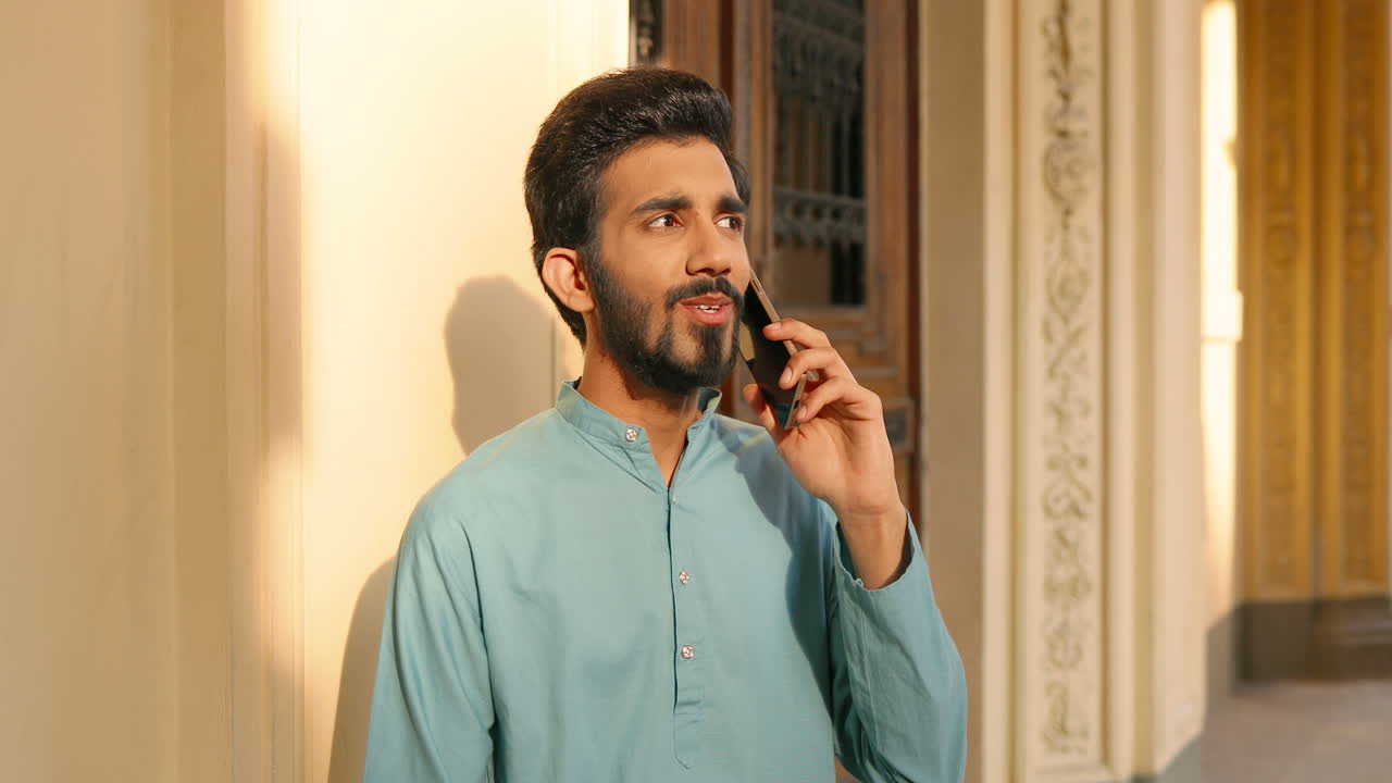 Free stock video - Portrait of an indian man talking on the phone and ...