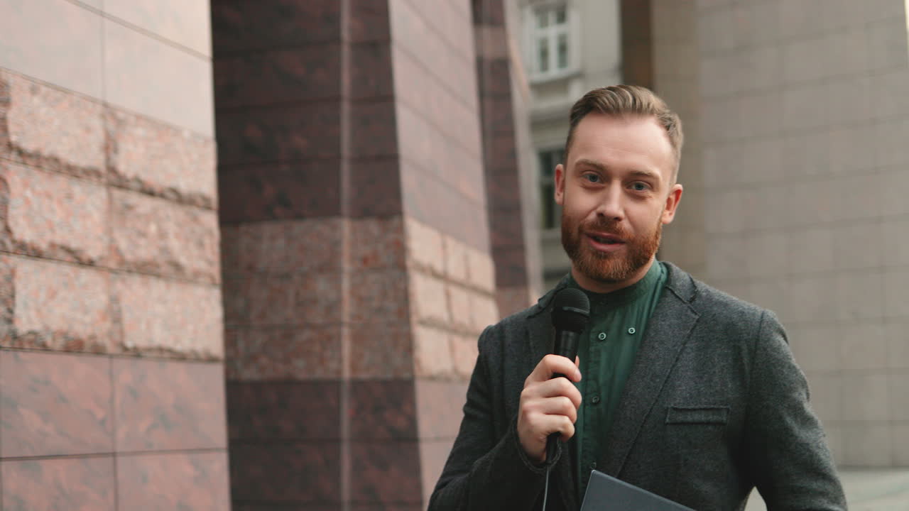 Free stock video - Smiling caucasian male journalist speaking on the ...