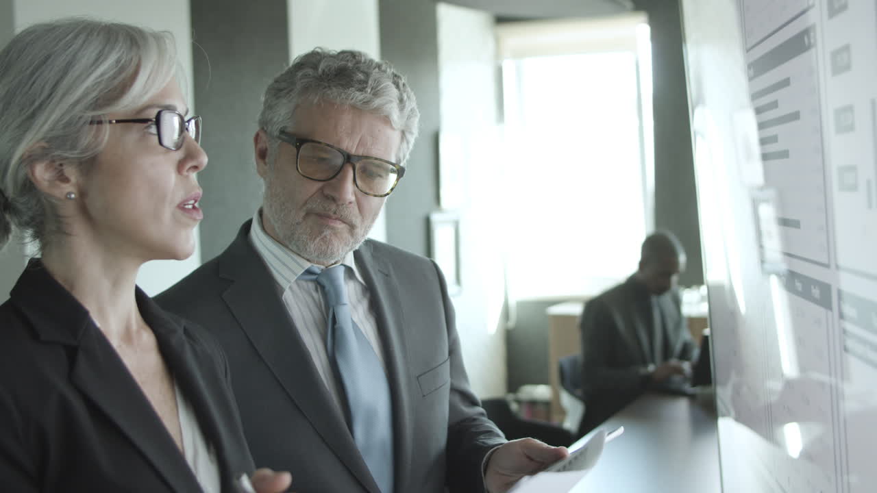 Free stock video - Female financial expert explaining statistic report ...