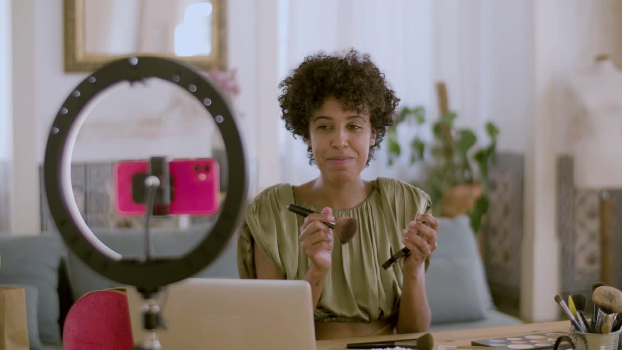 Free stock video - African american vlogger recording video for her ...