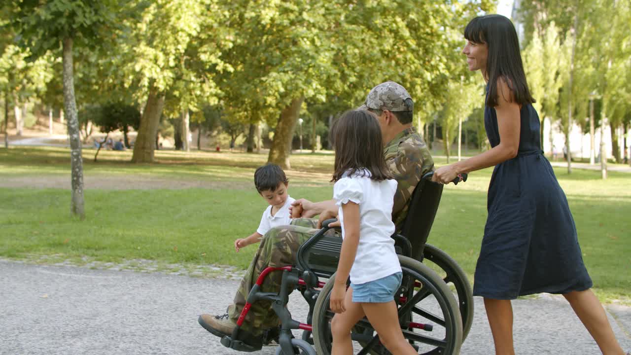 Free stock video - Disabled retired military man walking with family in ...