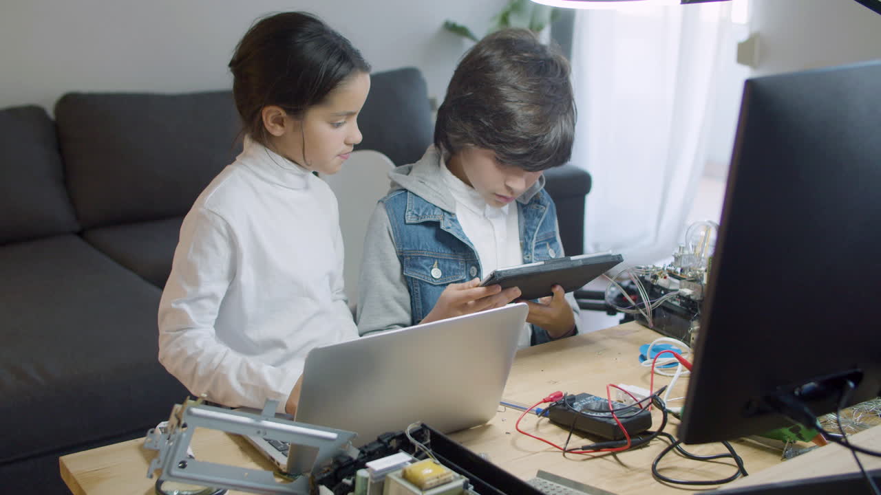 Free stock video - Smart children working on electrical project