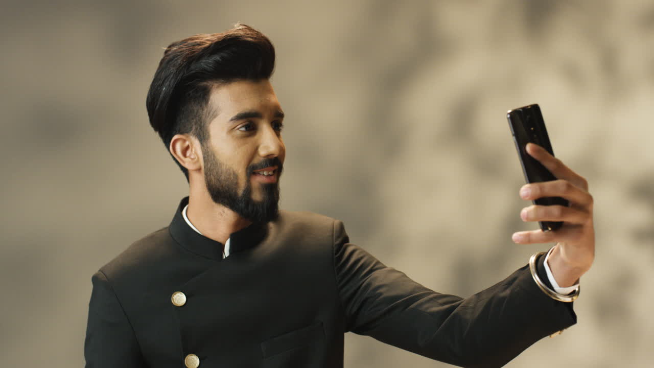 Free stock video - Young cheerful indian man in traditional clothes ...