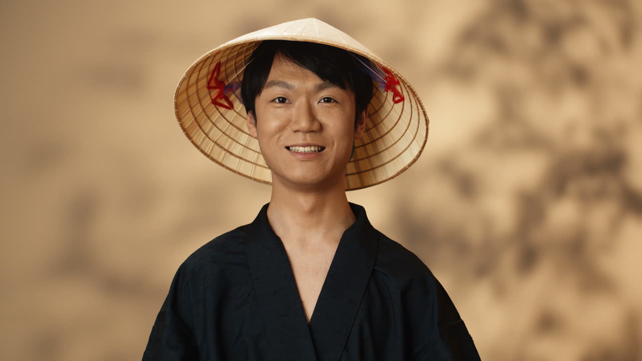 Free stock video - Young asian man in black traditional costume and ...