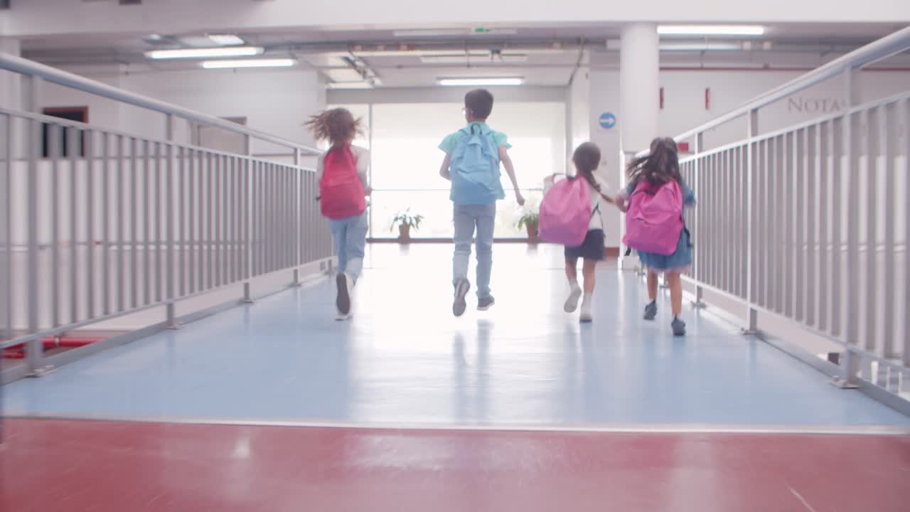 Free stock video - Excited schoolkids of different ages running through ...