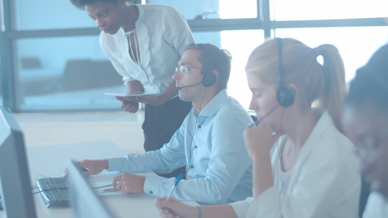 Free stock video - Female african american coach checking tasks with ...