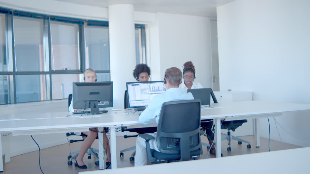 Free stock video - Mix raced group of bank call center operators