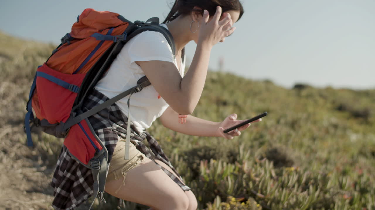 Free stock video - Girl taking photo with her phone while backpacking ...