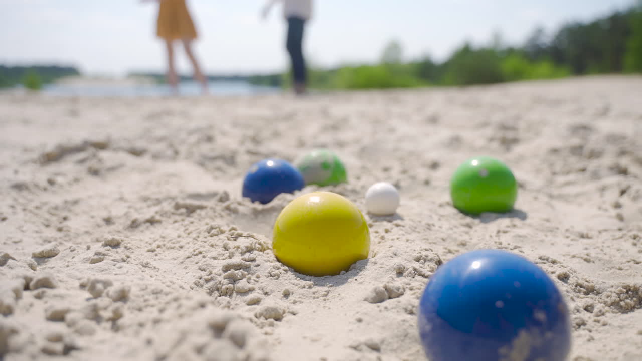 Free stock video - Close-up view of some colorful petanque balls on the ...