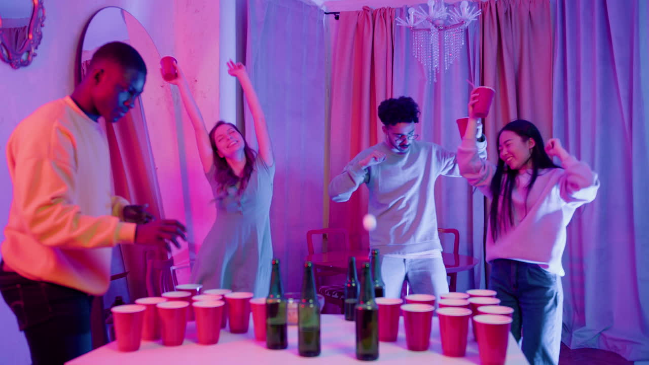Free stock video - Happy multiethnic young friends having a party at home