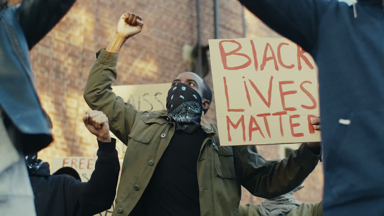 Free stock video - African american man yelling and holding black lives ...