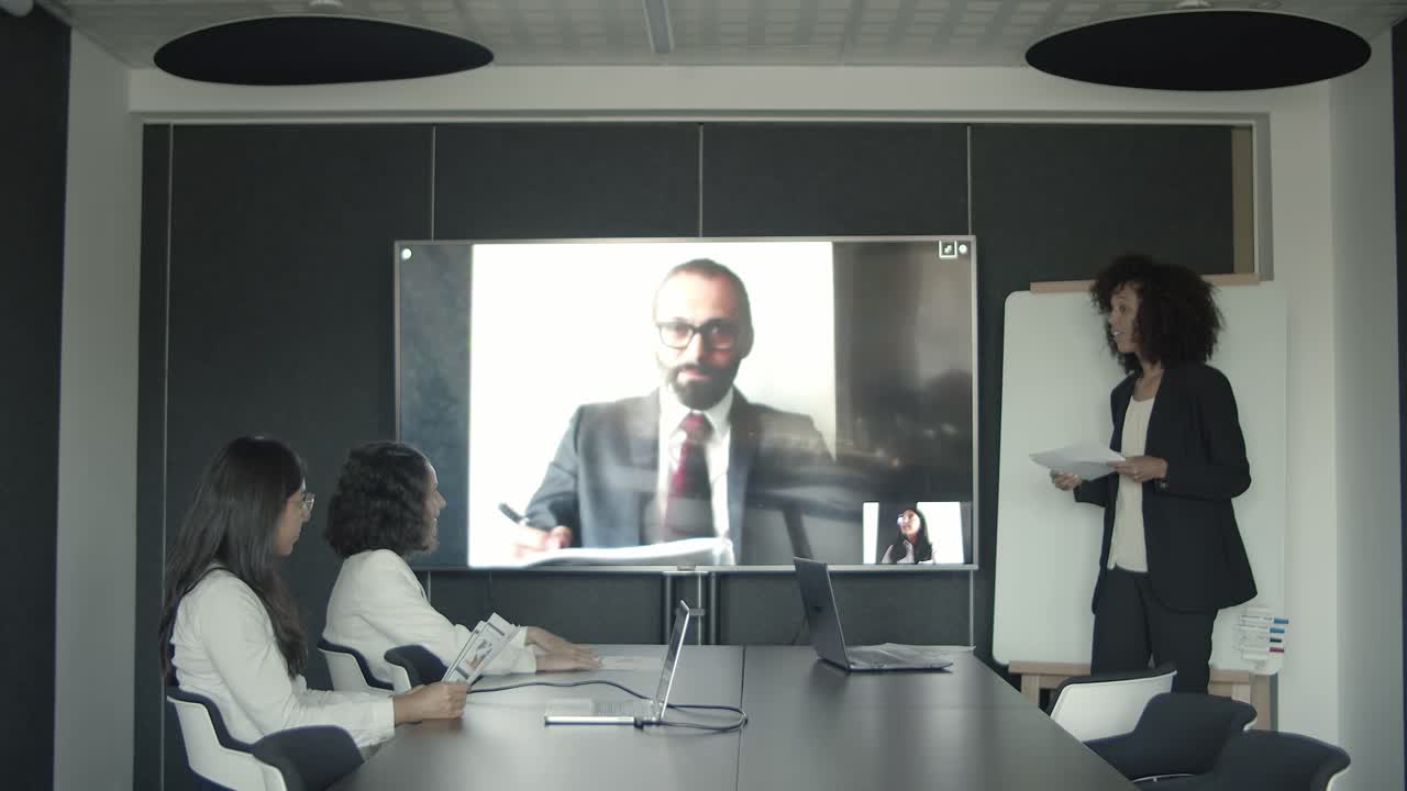 Free stock video - Businesswomen meeting with bearded ceo during video ...