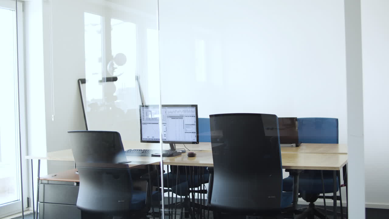 Free stock video - Empty office workplace with computes