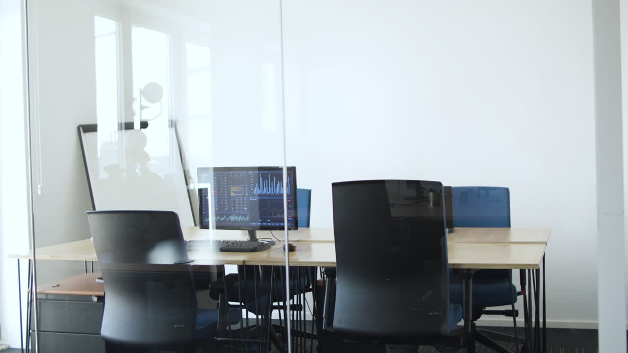 Free stock video - Empty office room with computer with data