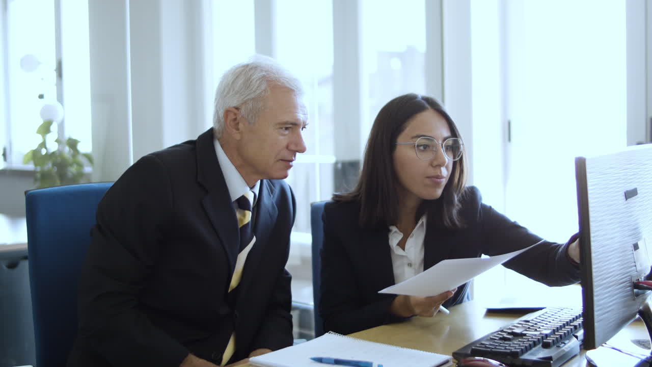 Free stock video - Female manager explaining project details to her boss