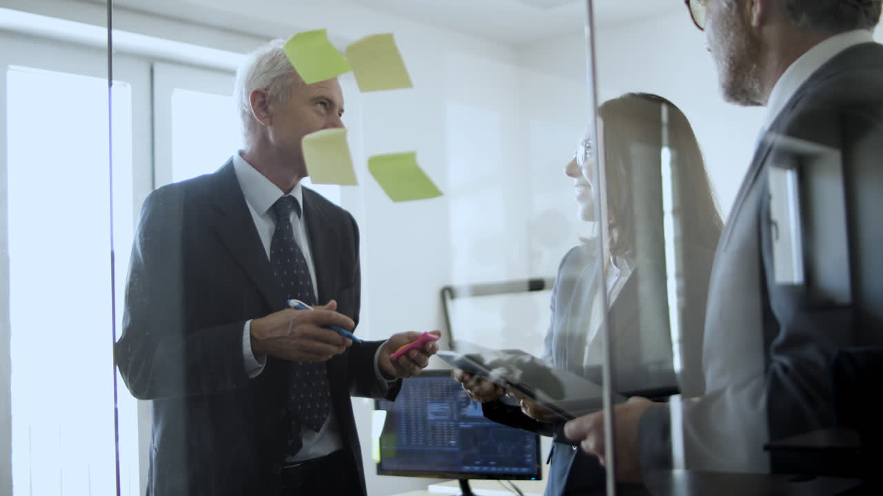 Free stock video - Mature company leaders and young project manager in ...