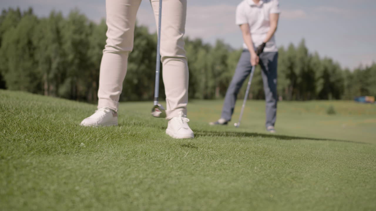 Free stock video - People playing golf on sunny day