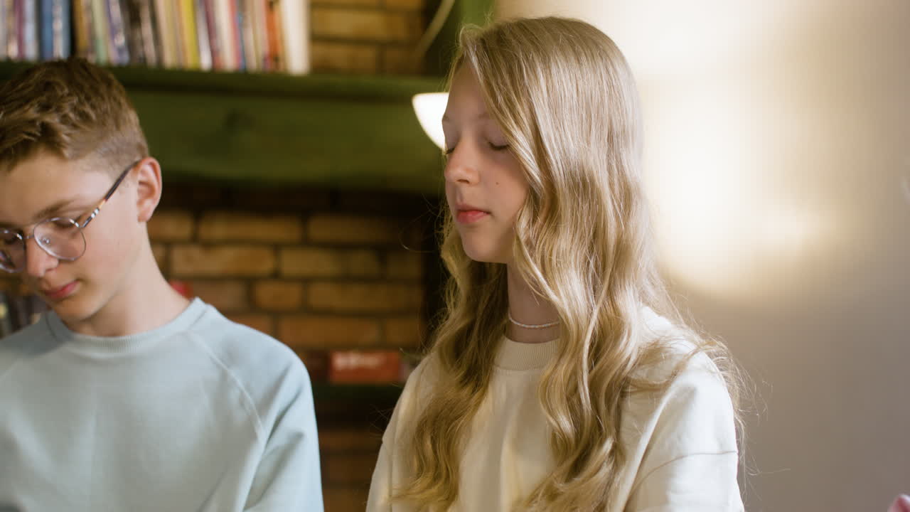 Free stock video - Young students holding hands with closed eyes and ...