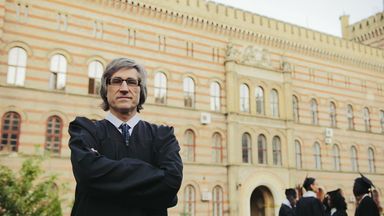 Free stock video - Portrait of the gray-haired male professor in ...