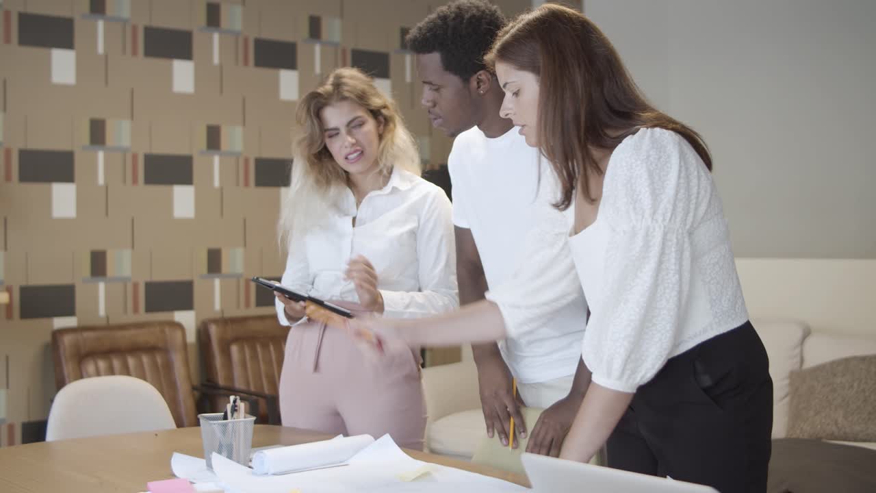 Free stock video - Creative group working on project