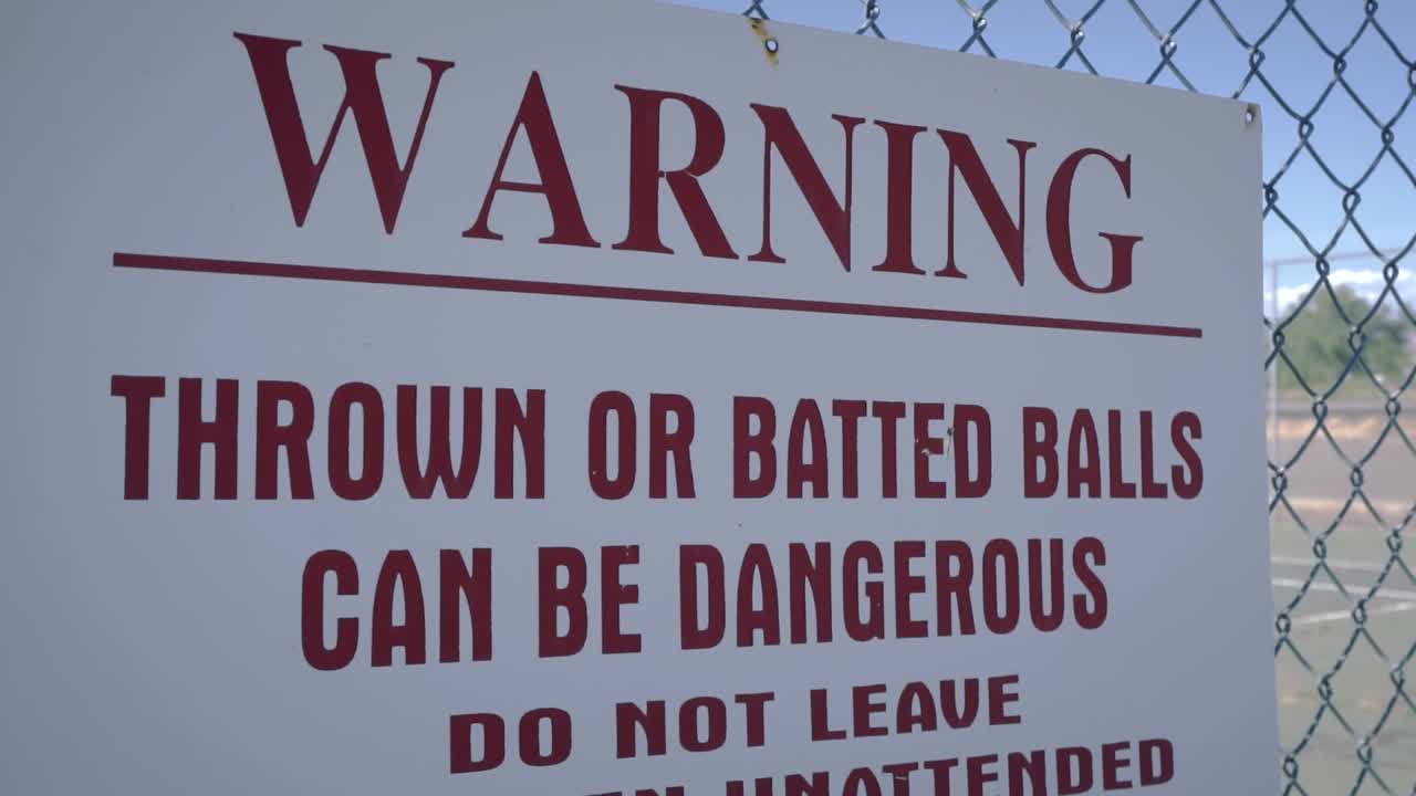 Premium stock video - Pan right reveal shot of an old warning balls ...