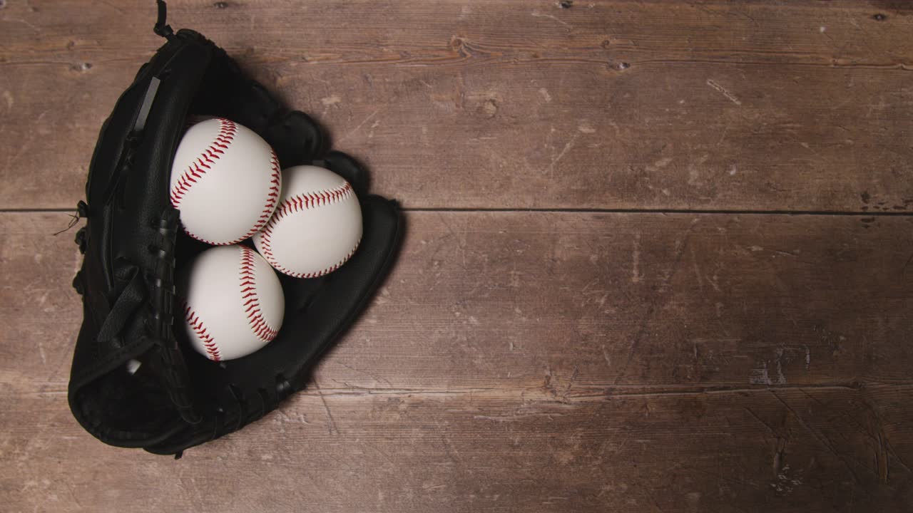 Free stock video - Overhead studio baseball still life with balls in ...