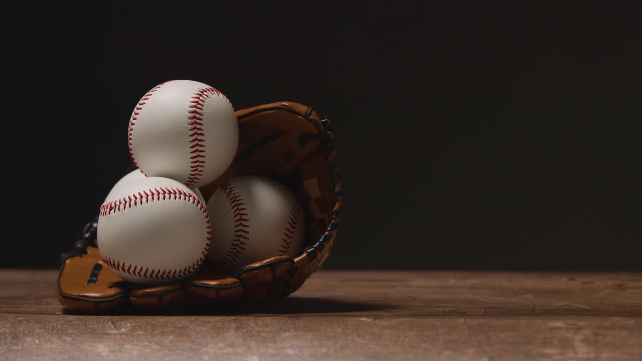 Free stock video - Close up studio baseball still life with balls in ...
