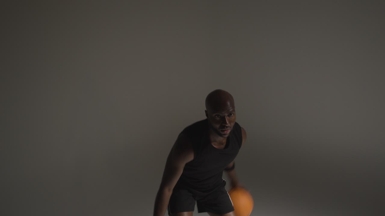 Free stock video - Studio action shot of male basketball player ...