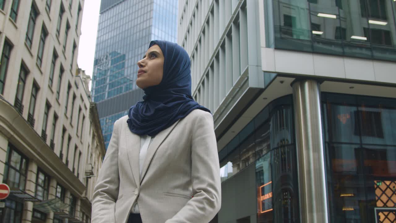 Free stock video - Muslim businesswoman outdoors standing in front of ...