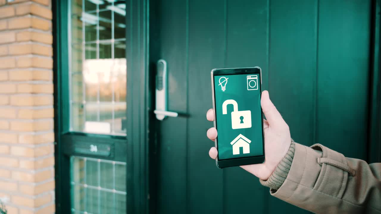 Mobile Phone Shows App To Lock And Unlock Front Door In Smart Home Free ...