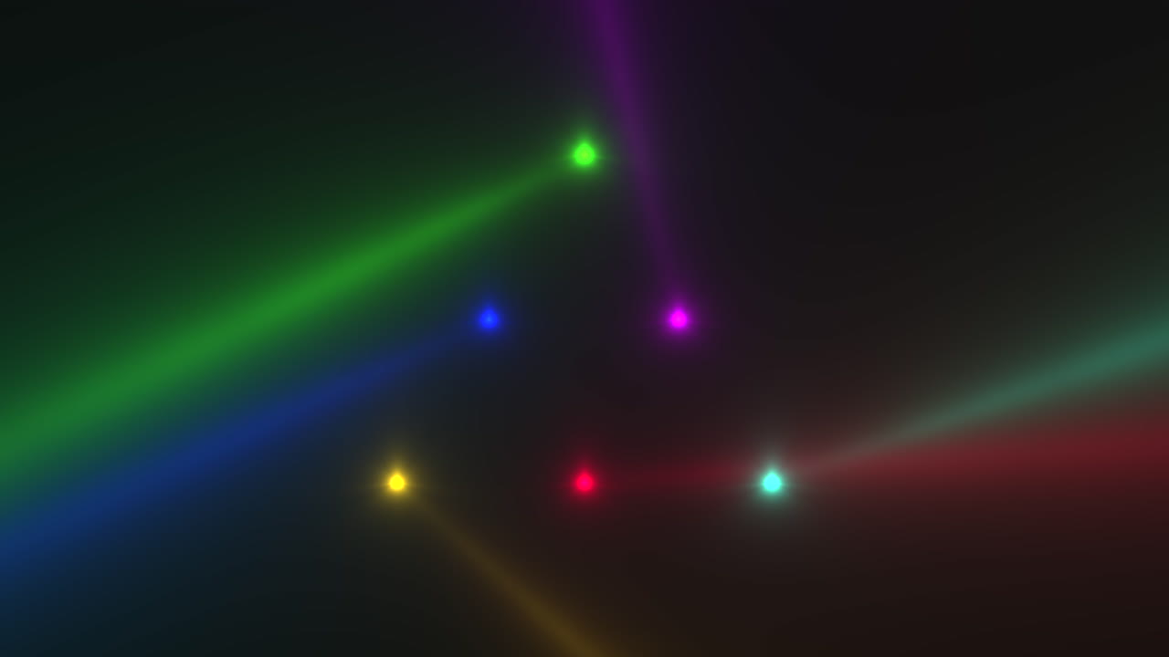 Premium stock video - Glowing neon rainbow spotlight rays on disco stage