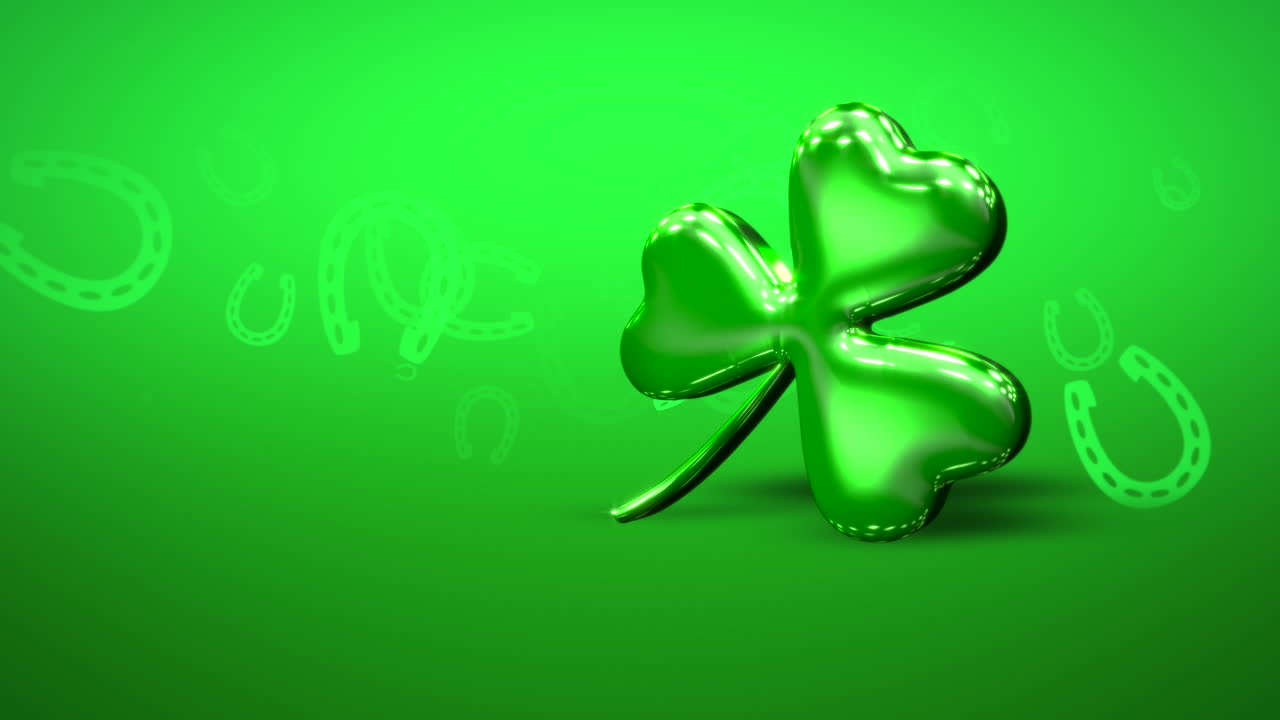 Premium stock video - Closeup irish shamrock on green gradient