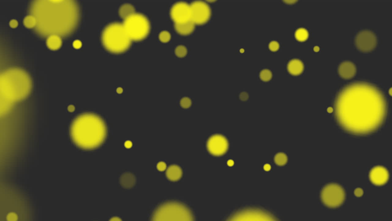 Premium stock video - Fly abstract yellow particles and glitters on ...