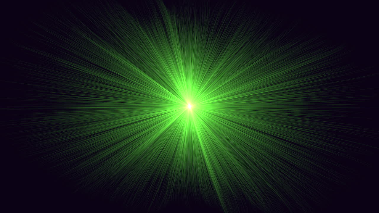 Premium stock video - Green flash and light beams from stat in dark galaxy