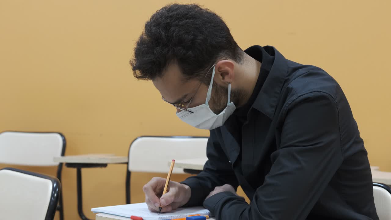 Premium stock video - Student working desk