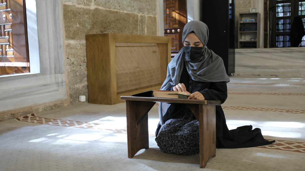 Premium stock video - Islamic teachings are written in the quran