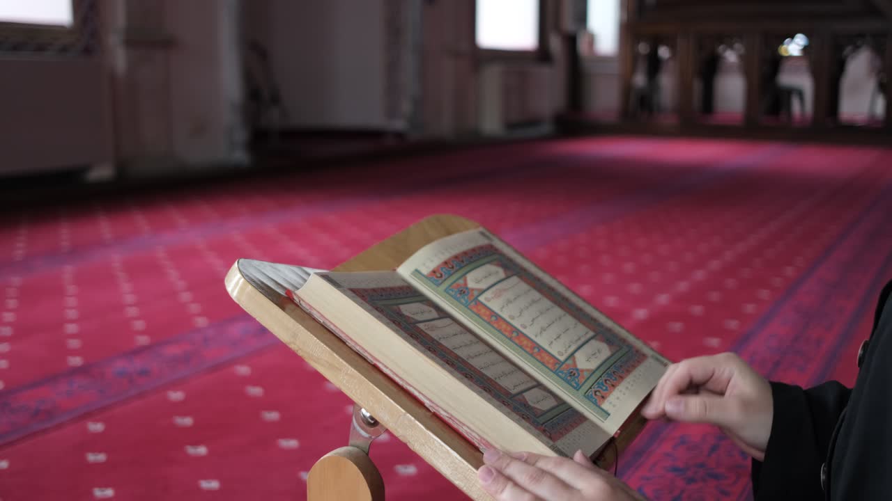 Premium stock video - Reading quran at mosque