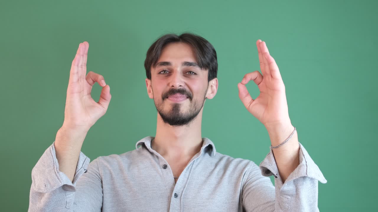 Premium stock video - Guy okey sign