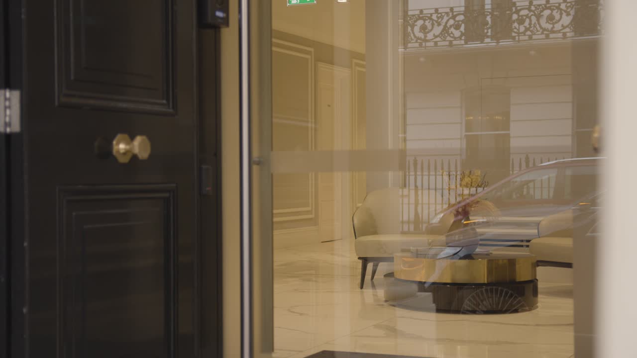 Free stock video - View through door of reception of office building in ...