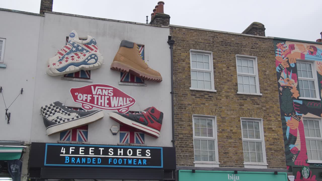 Free stock video - Advertising display on shoe shop store building in ...