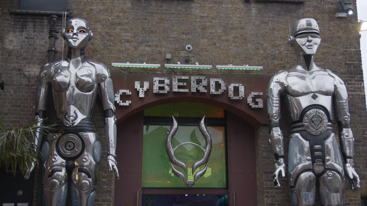 Free stock video - Robot statues outside cyberdog fashion store in ...