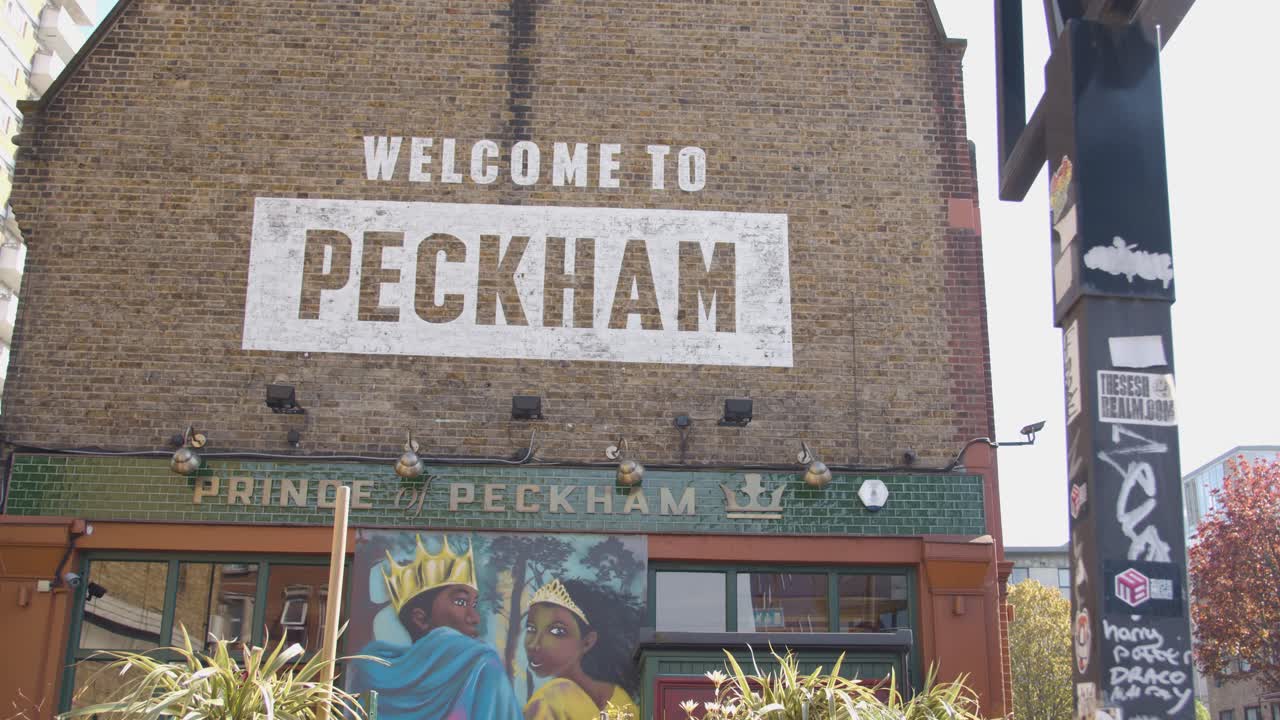 Free stock video - Welcome to peckham painted on pub with street art on ...