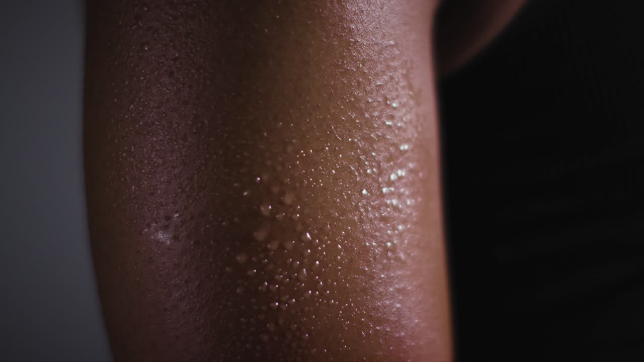 Free stock video - Close up shot of beads of sweat on woman wearing gym ...