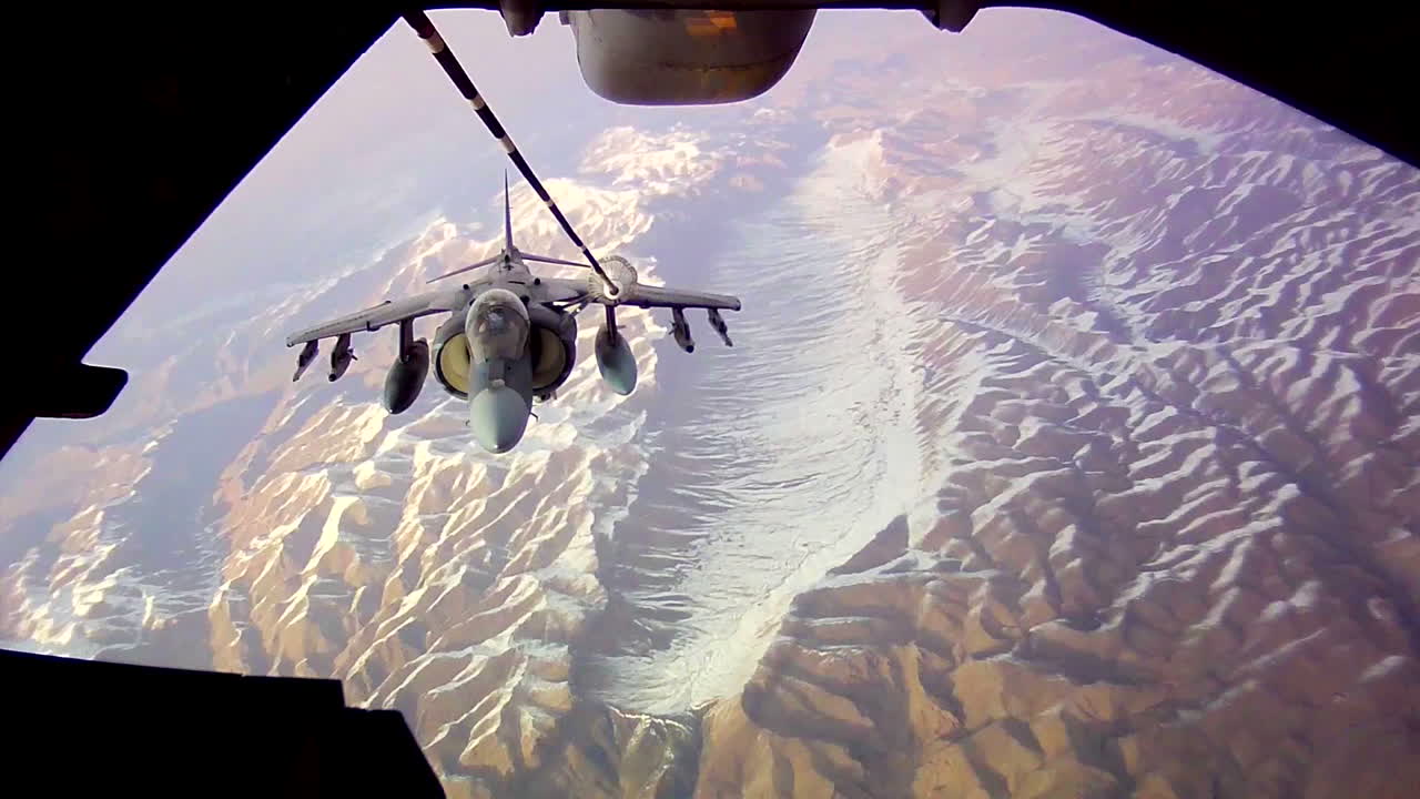 A Jet Fighter Refuels In Midair Over Afghanistan 1 Free Stock Video ...